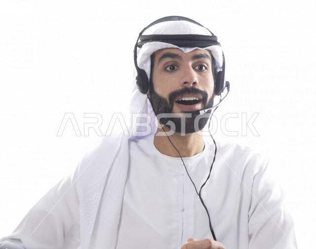 Portrait of an Arab Gulf Emirati employee working in customer service ...