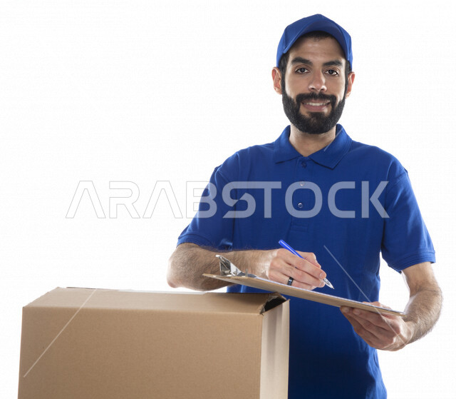Portrait of an Arab Emirati Gulf man wearing a blue hat working in ...
