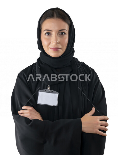 Portrait of a smiling, veiled Emirati Arab Gulf woman, wearing a blank ...
