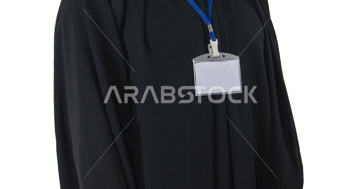 Portrait of a smiling, veiled Emirati Arab Gulf woman, wearing a blank ...