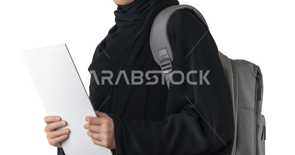 Portrait of a smiling, veiled Arab Emirati Gulf university student ...
