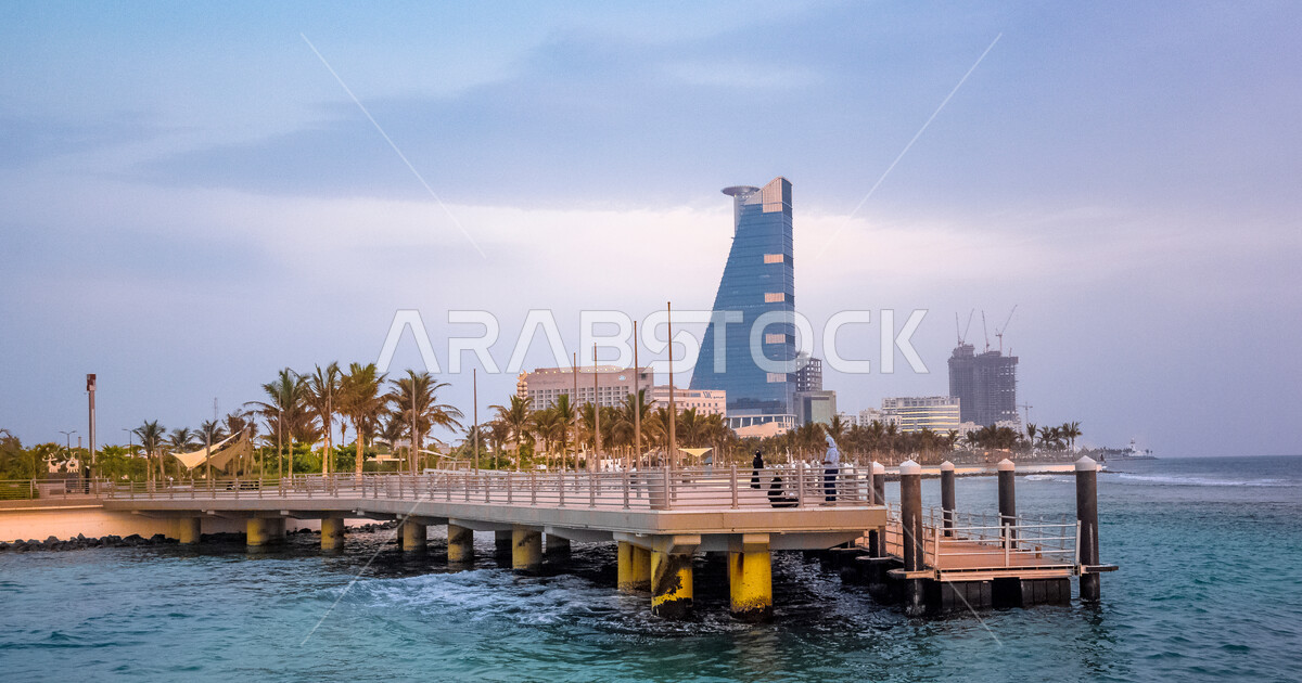 A wonderful view of the sunrise in the skyline of the city of Jeddah ...