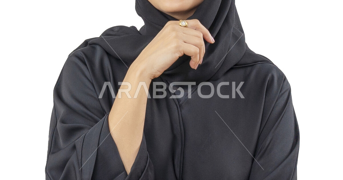 Portrait of an Arab Emirati Gulf woman wearing abaya and hijab, face and hand gestures ...