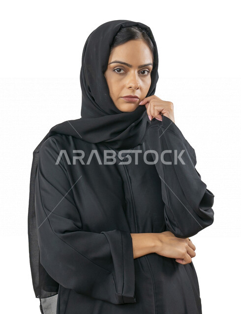 Portrait of an Arab Emirati Gulf woman wearing abaya and hijab, face and hand gestures ...