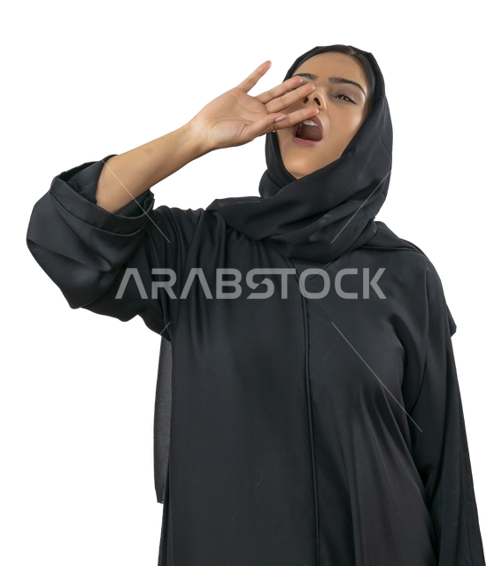 Portrait of an Arab Emirati Gulf woman wearing an abaya and a veil, making facial gestures ...