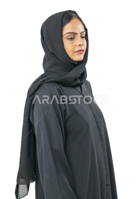 Portrait of an Emirati Arab Gulf woman wearing abaya and hijab, making various gestures holding ...