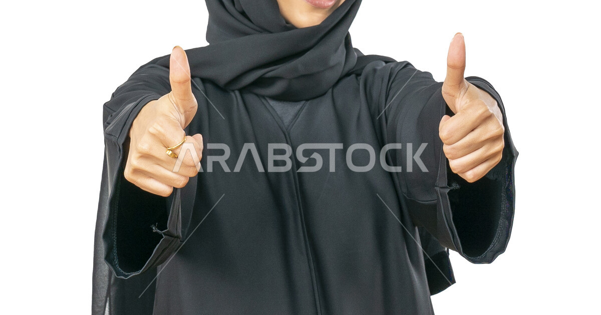 Portrait of an Arab Emirati Gulf woman wearing abaya and hijab, gestures of two hands indicating ...
