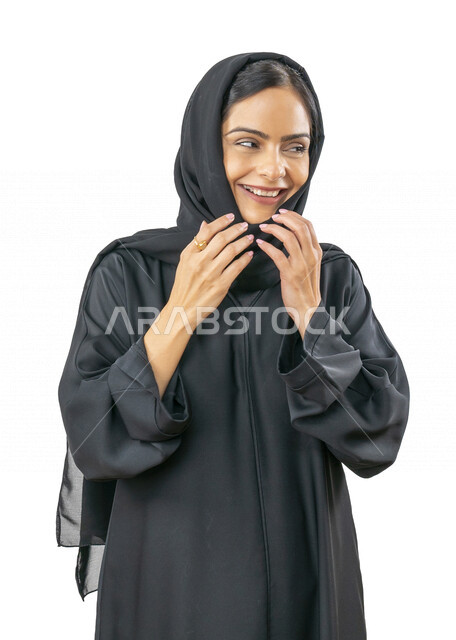 Portrait of an Arab Emirati Gulf woman wearing abaya and hijab, face and hand gestures ...