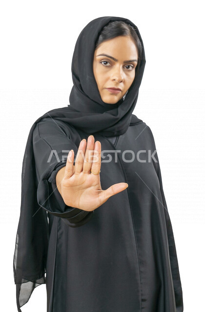 Portrait of an Arab Emirati Gulf woman wearing abaya and hijab, gestures of two hands indicating ...