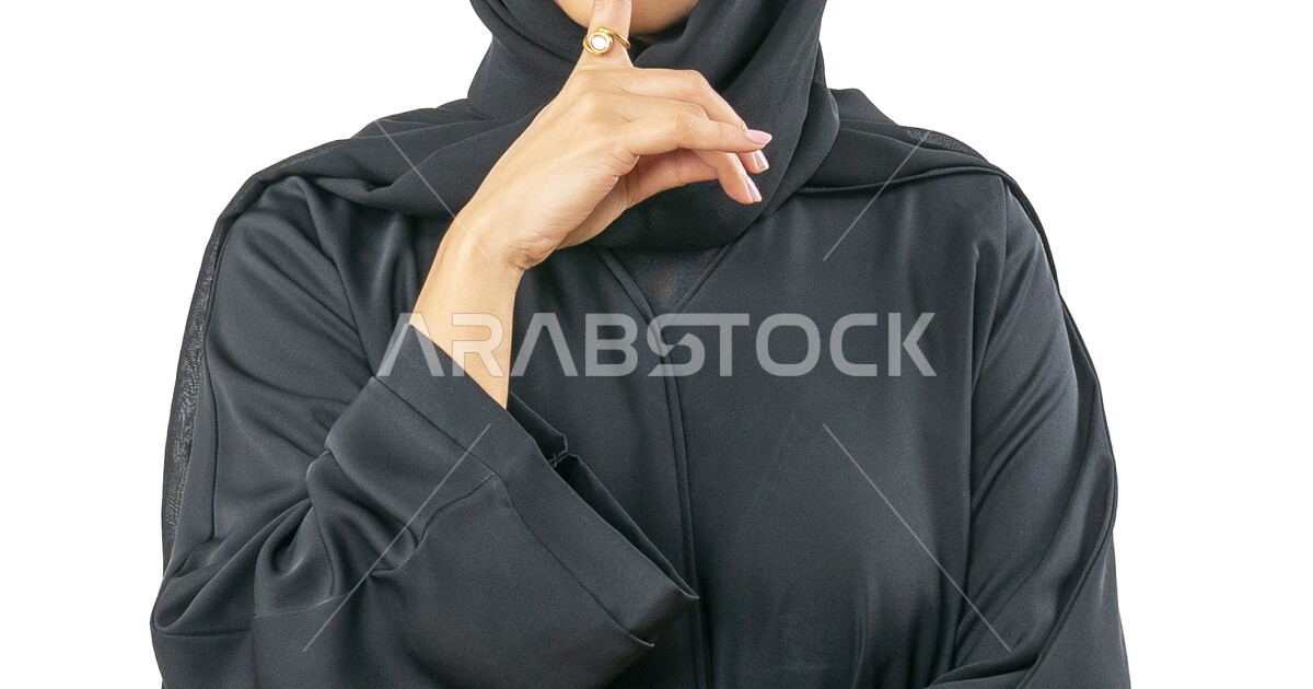 Portrait of an Arab Emirati Gulf woman wearing abaya and hijab, gestures of two hands indicating ...