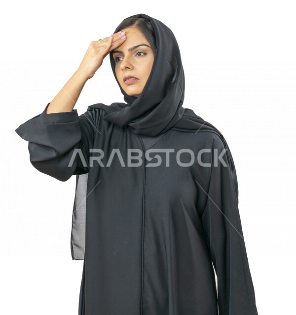Portrait of an Arab Emirati Gulf woman wearing abaya and hijab, making ...