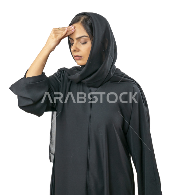 Portrait of an Arab Emirati Gulf woman wearing abaya and hijab, making facial gestures ...