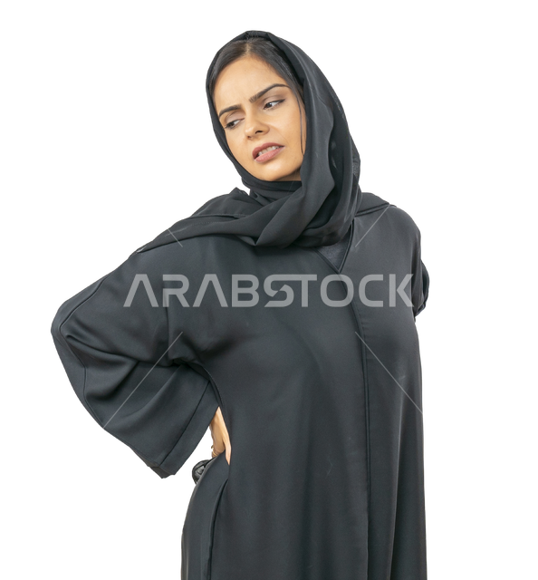 Portrait of an Arab Emirati Gulf woman wearing abaya and hijab, making facial gestures ...