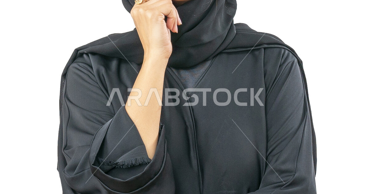 Portrait of an Emirati Arab Gulf woman wearing a Saudi cloak, making ...