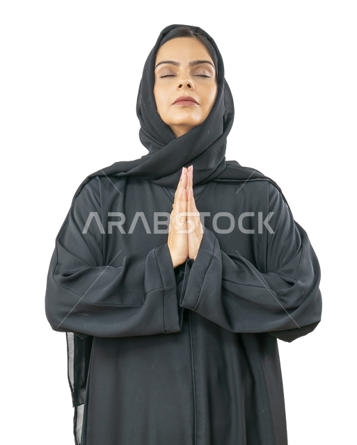 Portrait of an Arab Gulf Emirati woman wearing abaya and hijab, face and hand gestures ...