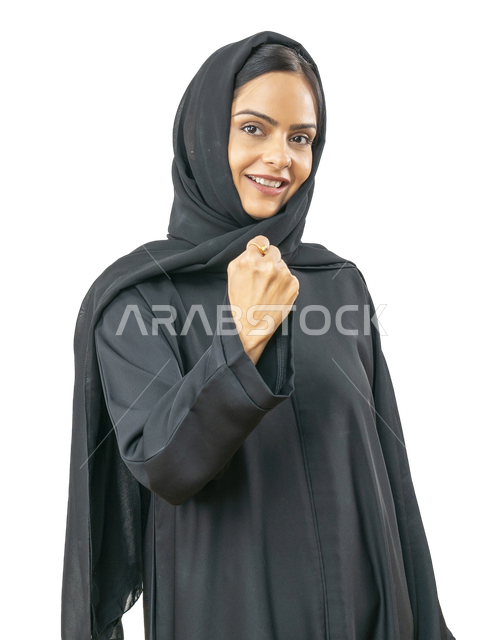 Portrait of an Arab Gulf Emirati woman wearing the abaya, making gestures and facial expressions ...