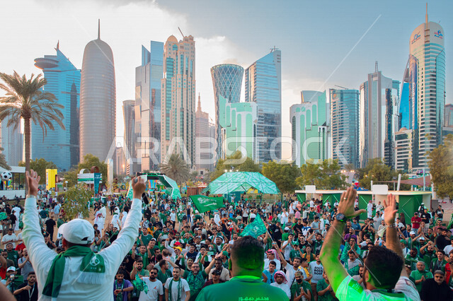 The fans of the Saudi national team cheer and encourage the Saudi ...