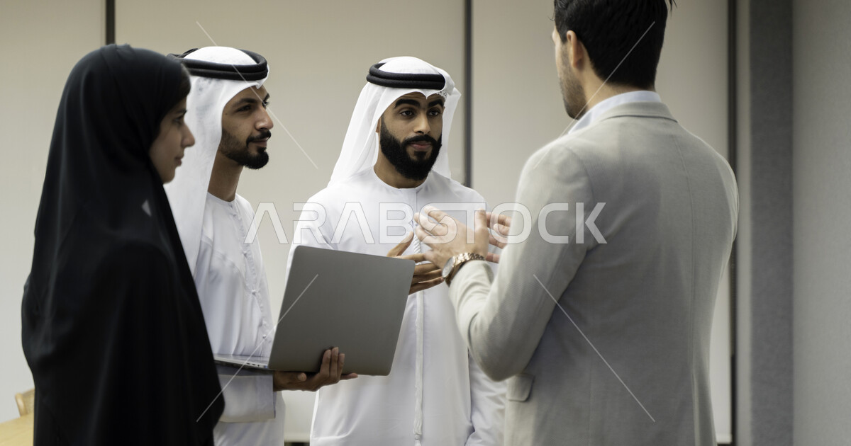 An Arab Emirati Gulf university professor explains to his students the ...