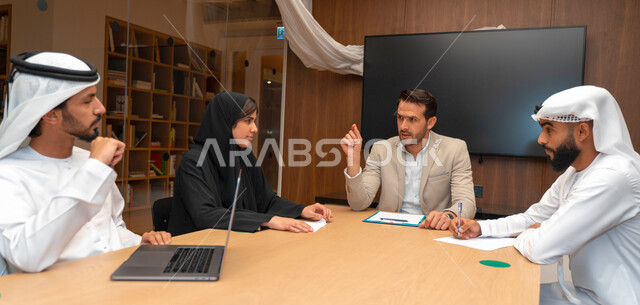 A group of Emirati Gulf Arab female and male students at the university ...