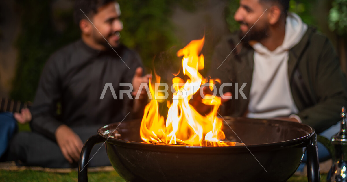 A close-up of the flames burning in the fireplace of the heating fires ...