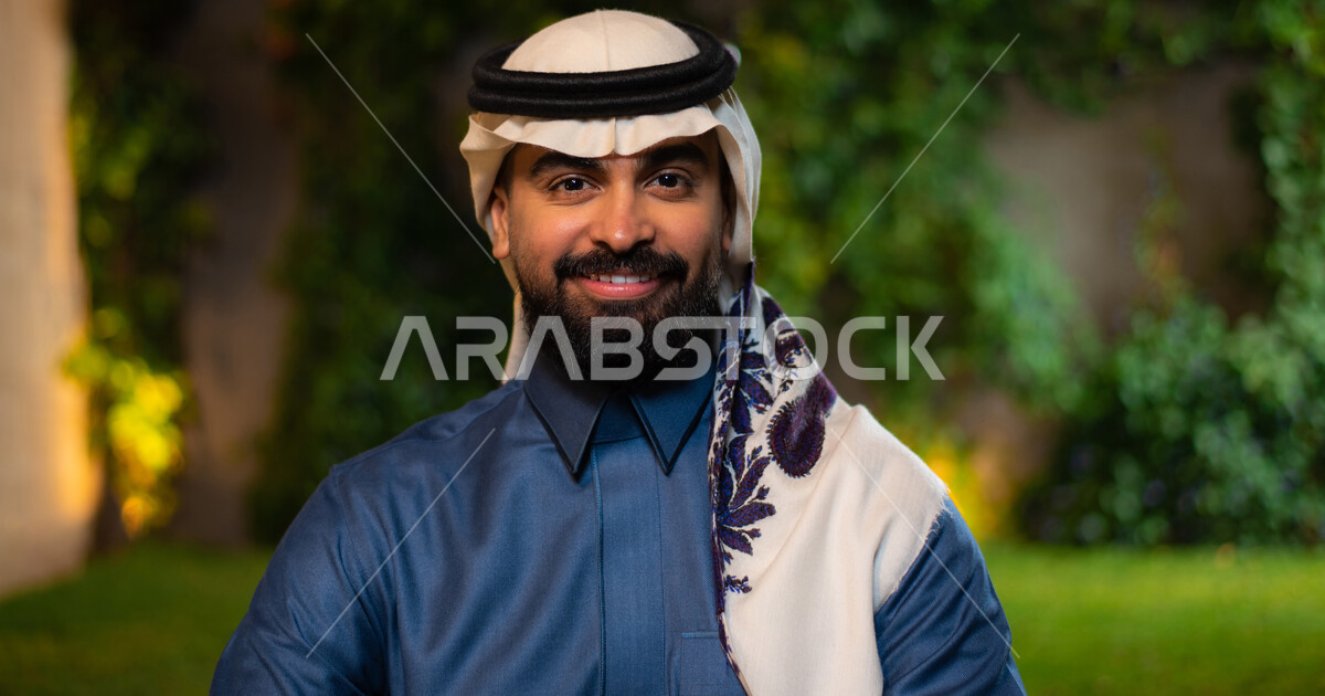 A young Saudi Arabian Gulf man wearing a winter dress, winter clothes ...