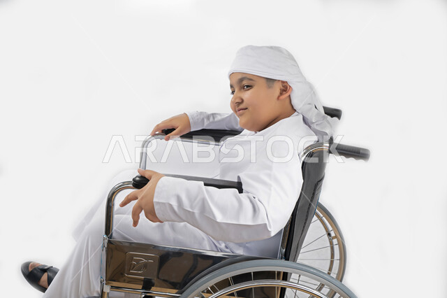 Portrait of an Arab Emirati Gulf child dressed in traditional clothes ...