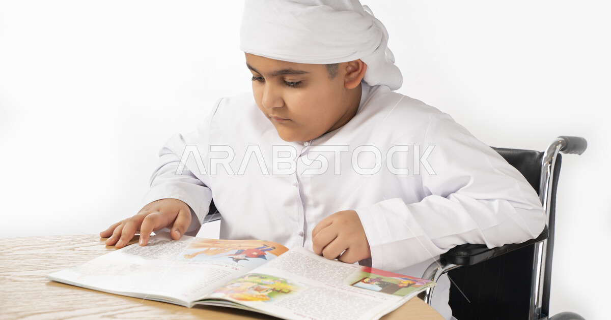 Portrait of an Arab Emirati Gulf child dressed in traditional clothes ...