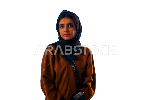 Portrait of a Saudi Arab Gulf woman wearing an elegant colorful abaya ...