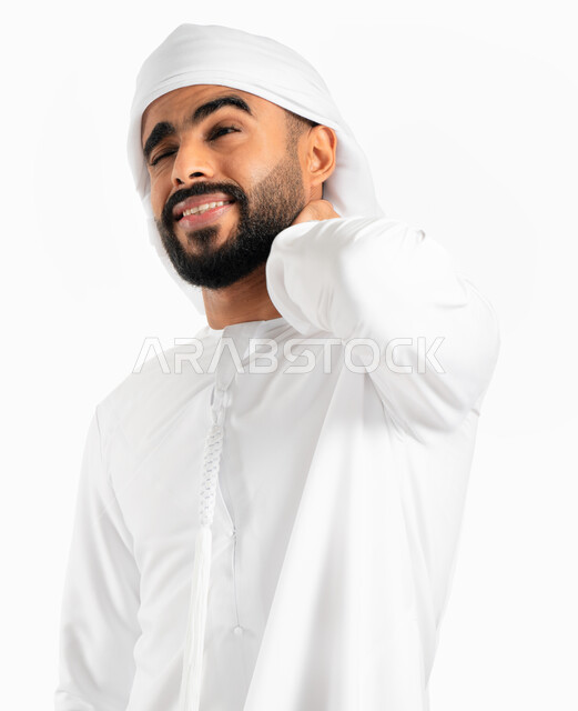 Neck and spine pain, a portrait of a Gulf Arab Emirati man wearing a ...