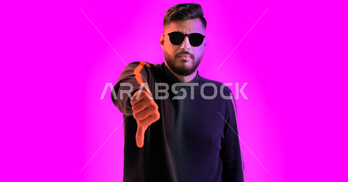 Portrait of a close-up of an Emirati Arab Gulf man in casual attire ...