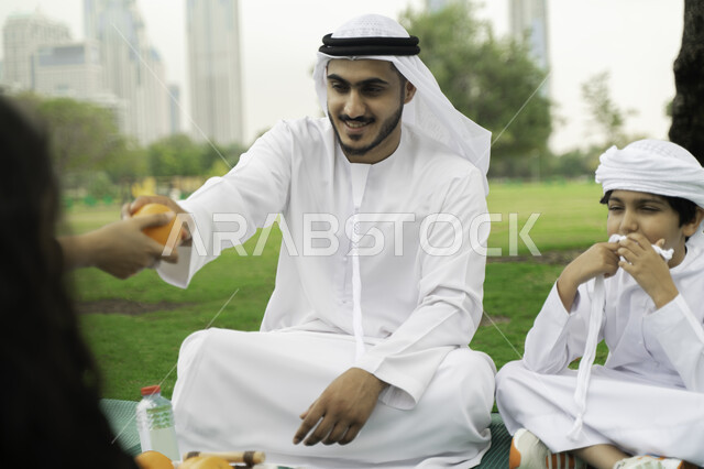 Laughter and communication among family members, a local Saudi national ...