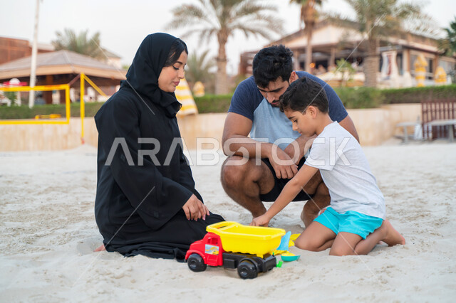 Spending fun family times on the summer vacation at the seaside, an ...