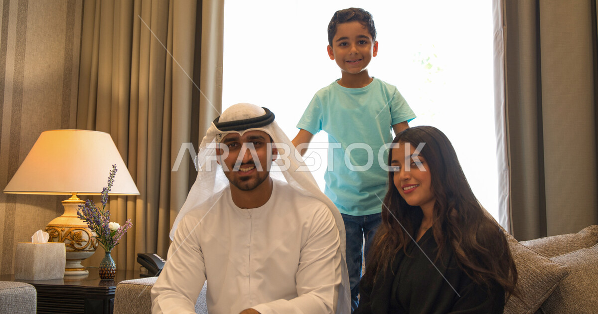 Gestures looking at the camera, family stability and security, home ...