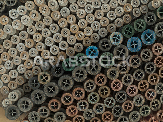 Aerial view of cable reels, equipment and extension tools, cable ...