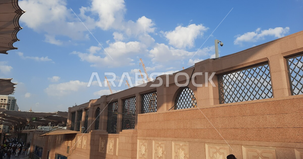 Muslims gathered in the outer complex of the Prophet’s Mosque in ...