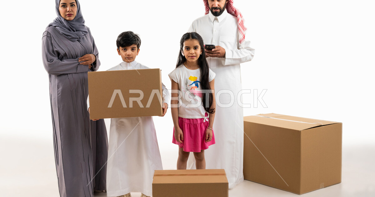 Cardboard boxes and containers full of household items, a portrait of a ...