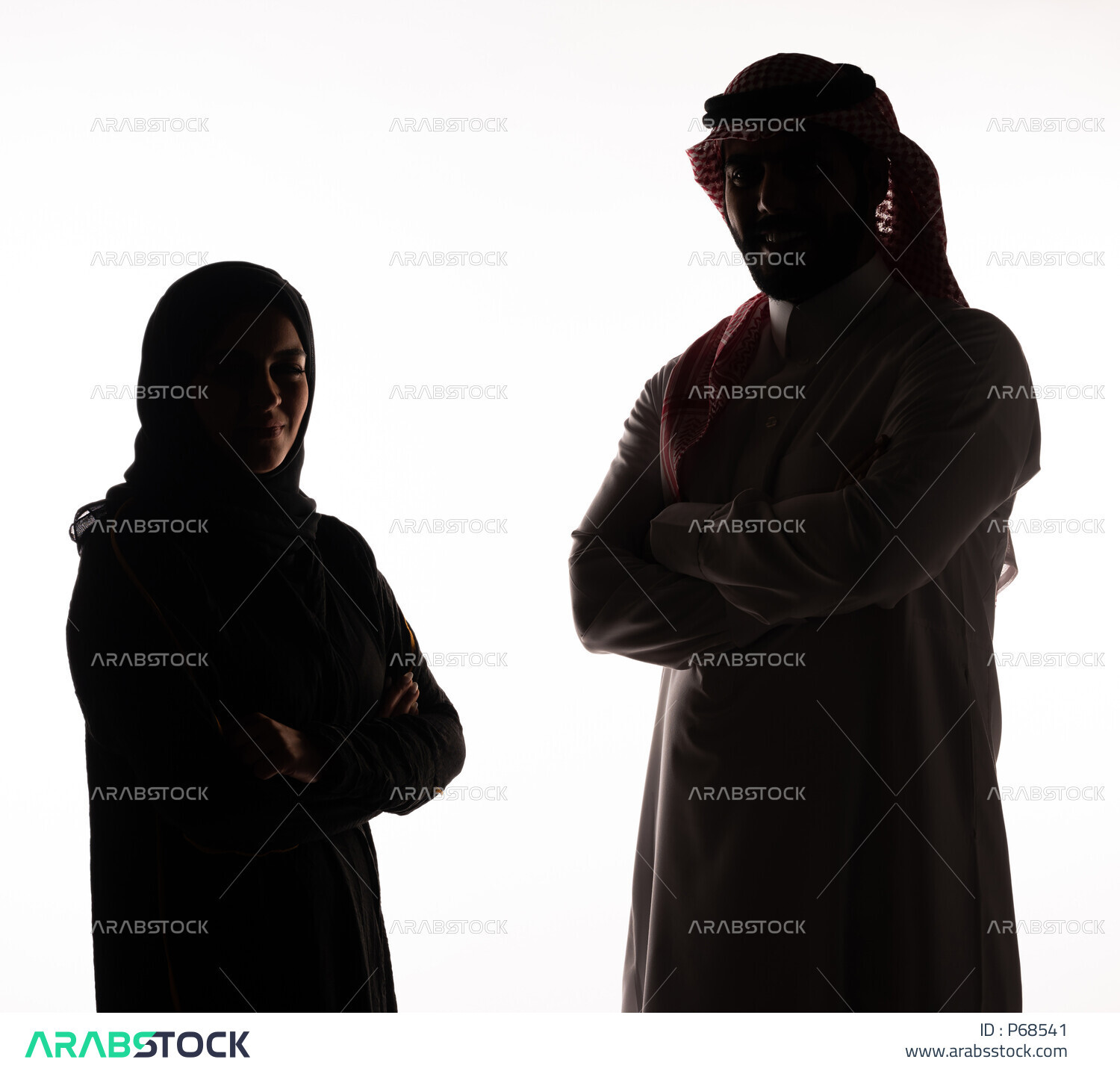 Portrait, silhouette of a Saudi Arabian Gulf couple, standing straight ...