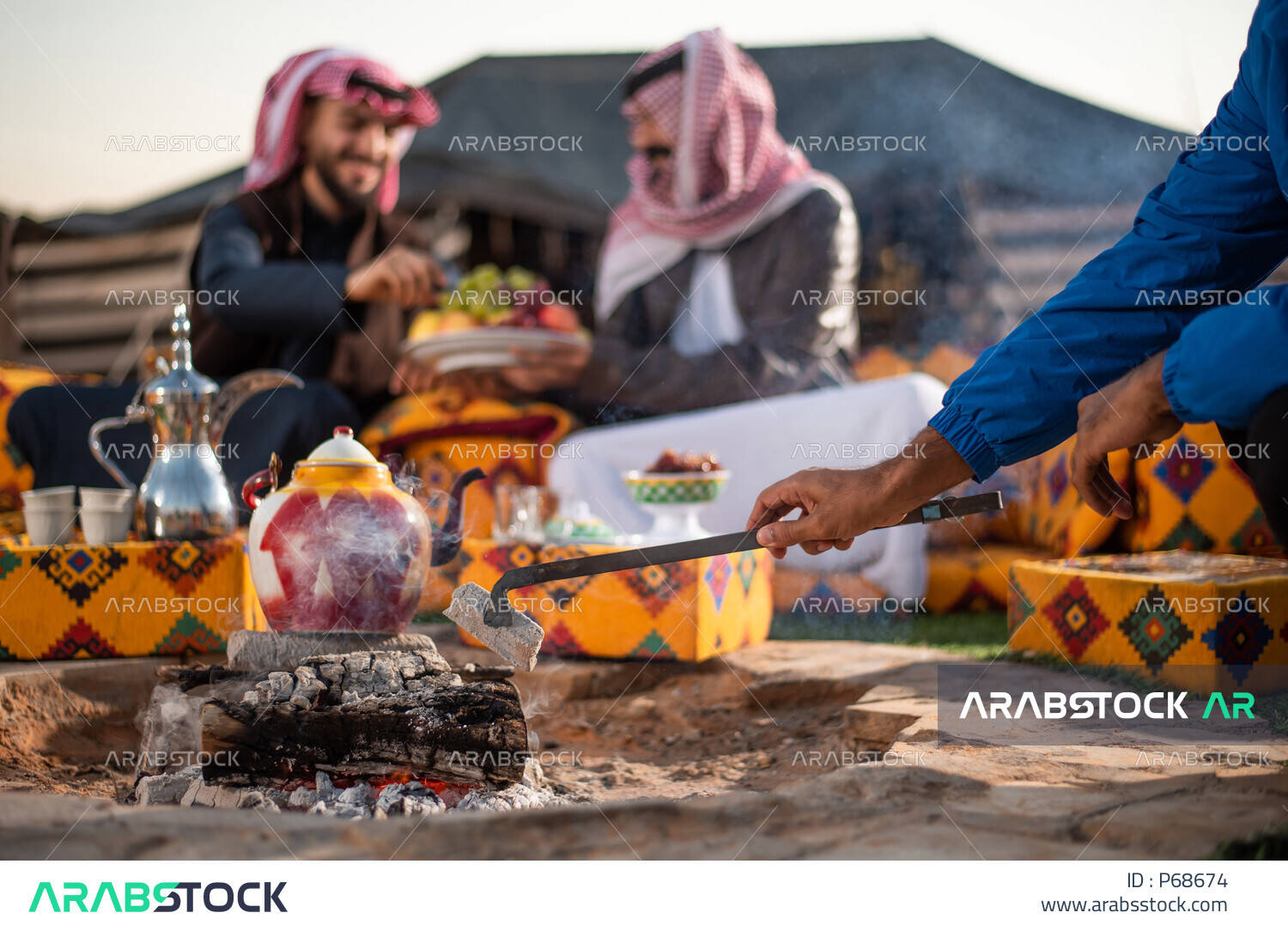A group of Saudi Arabian Gulf friends enjoying a wild camping trip in ...