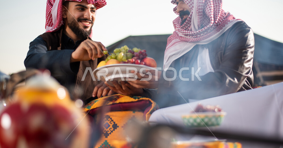 Saudi Gulf Arab friends enjoying a wild camping trip in the desert ...