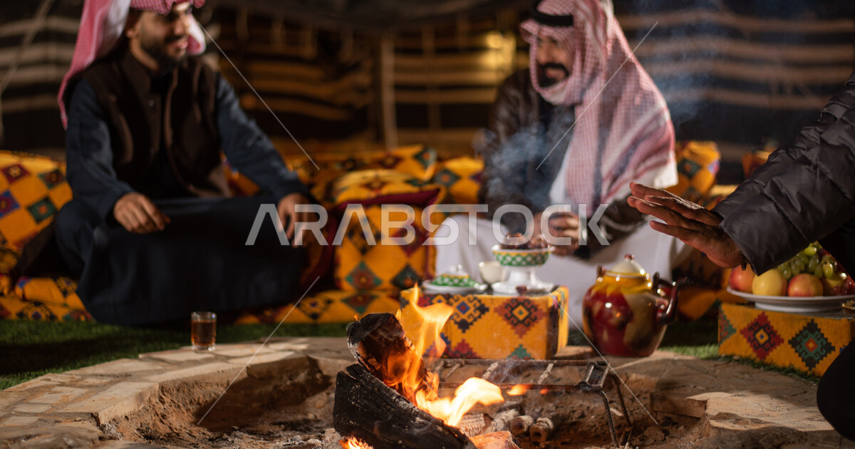 A group of Saudi Gulf Arab friends with gestures indicating the extreme ...