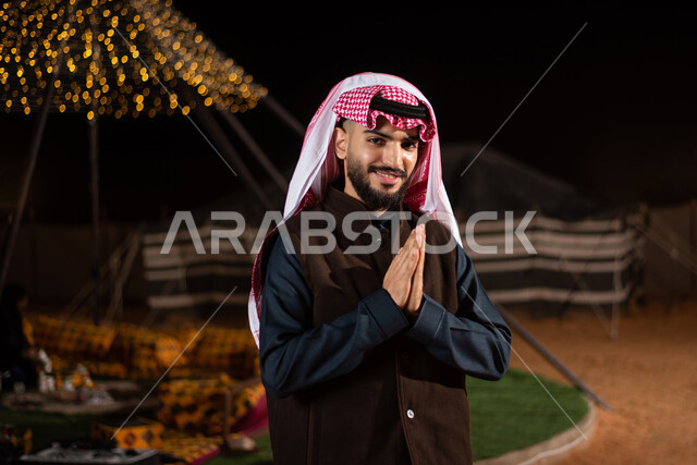 A Saudi Arabian Gulf man wearing warm winter clothes, face and hand ...