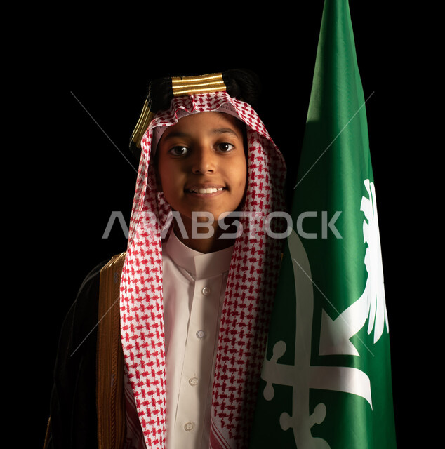 Portrait of a Saudi Arabian Gulf boy wearing the Saudi bisht and ...