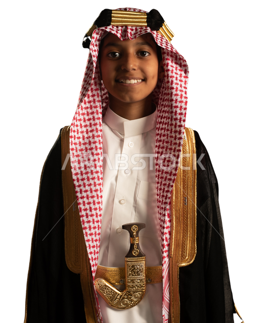 Portrait of a Saudi Arabian Gulf boy wearing a Saudi bisht, a Saudi ...