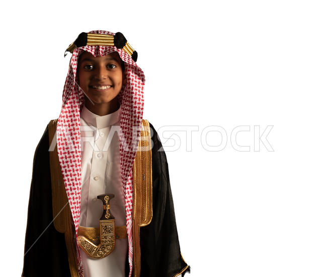 Portrait of a Saudi Arabian Gulf boy wearing the Saudi bisht ...
