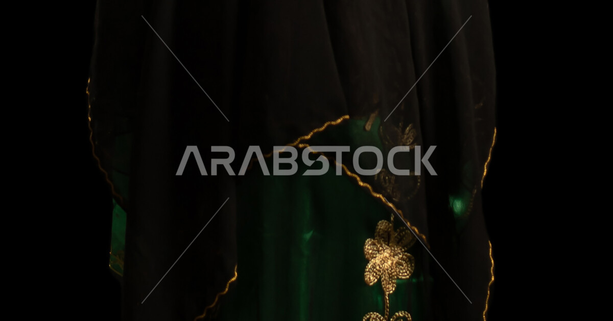 A picture from the back of a Saudi Arab Gulf girl wearing a traditional ...
