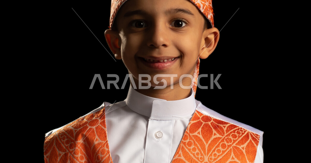 Portrait of a Saudi Arab Gulf boy wearing a traditional costume for ...