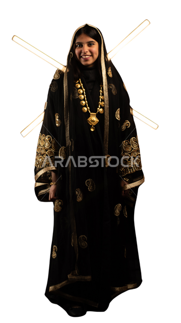 Portrait of a Saudi Arabian Gulf girl wearing a traditional costume for ...
