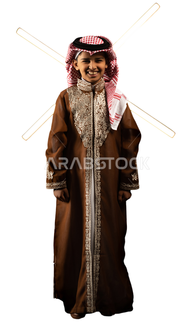 Portrait of a Saudi Arabian Gulf boy wearing a traditional costume for ...