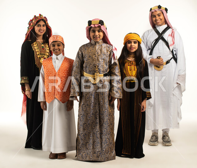 Portrait of a group of Saudi Arab children, wearing the traditional ...