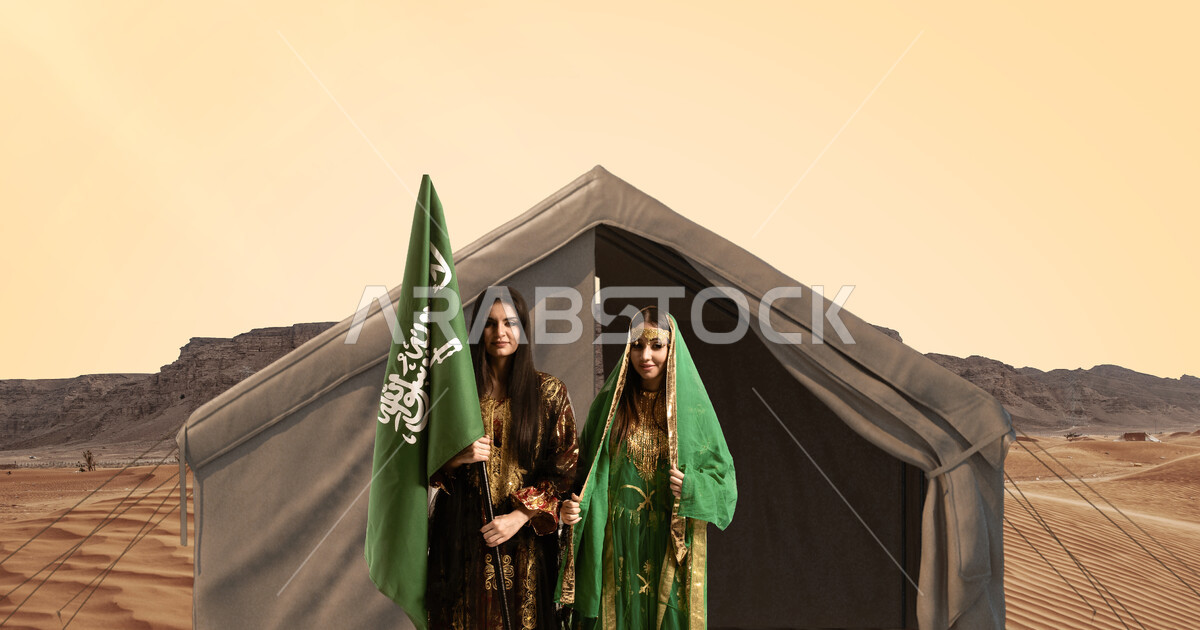 Saudi Gulf women celebrate the founding day in the desert, a Saudi Arab ...